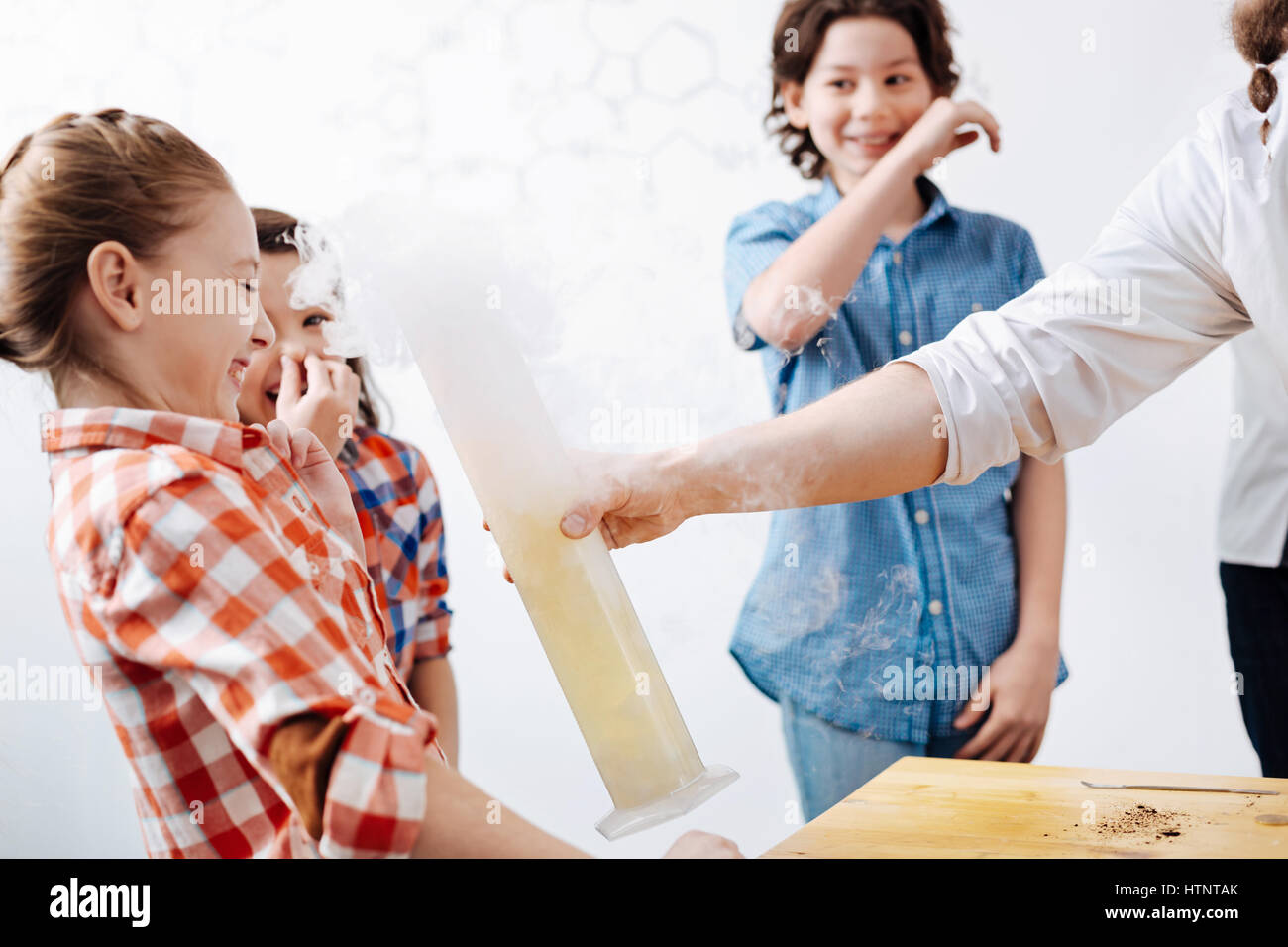 Pleasurable time. Positive carefree delighted children laughing and ...