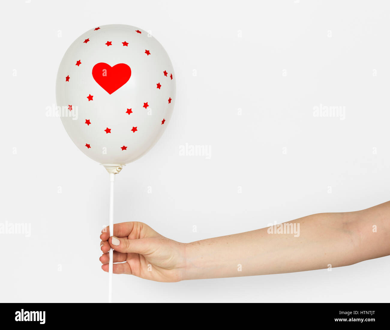 Hands Holding Balloon Heart Decoration Stock Photo - Alamy
