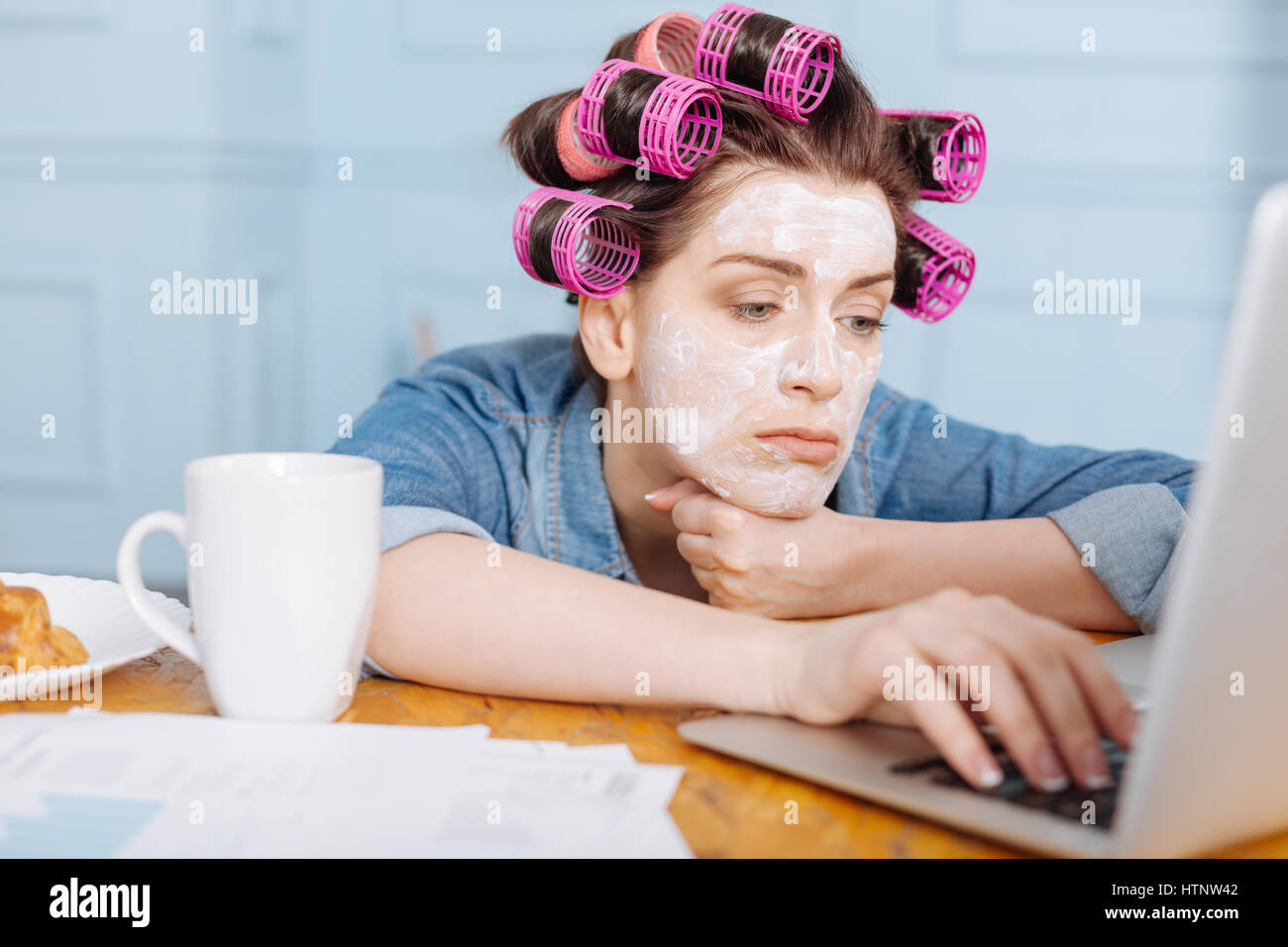 Nothing interesting. Wonderful emotional cute lady browsing through the ...