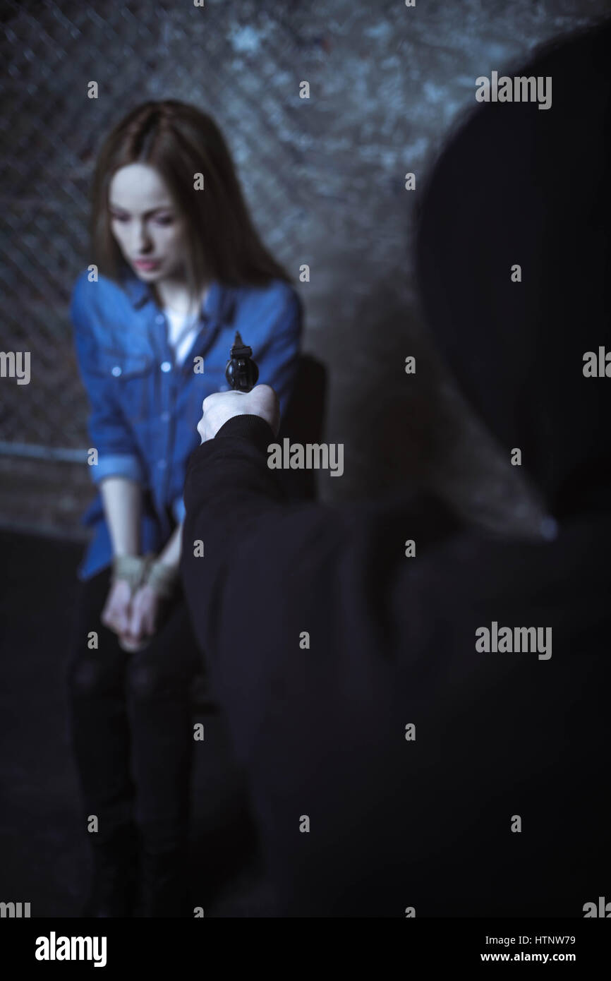 Keep your mouth shut. Violent lawless senseless kidnapper keeping a ...