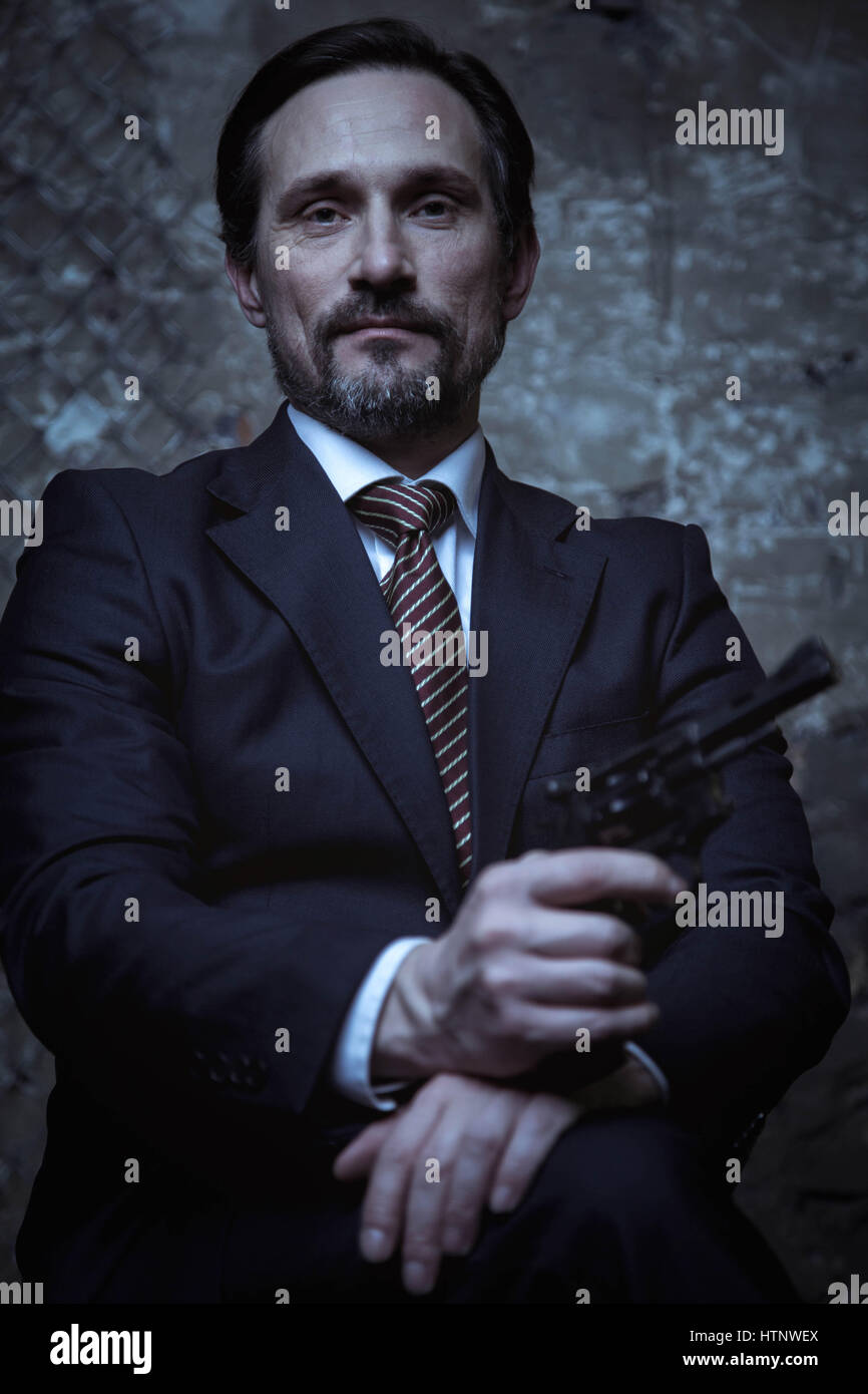 Look of power. Strong charismatic influential gentleman posing for a ...