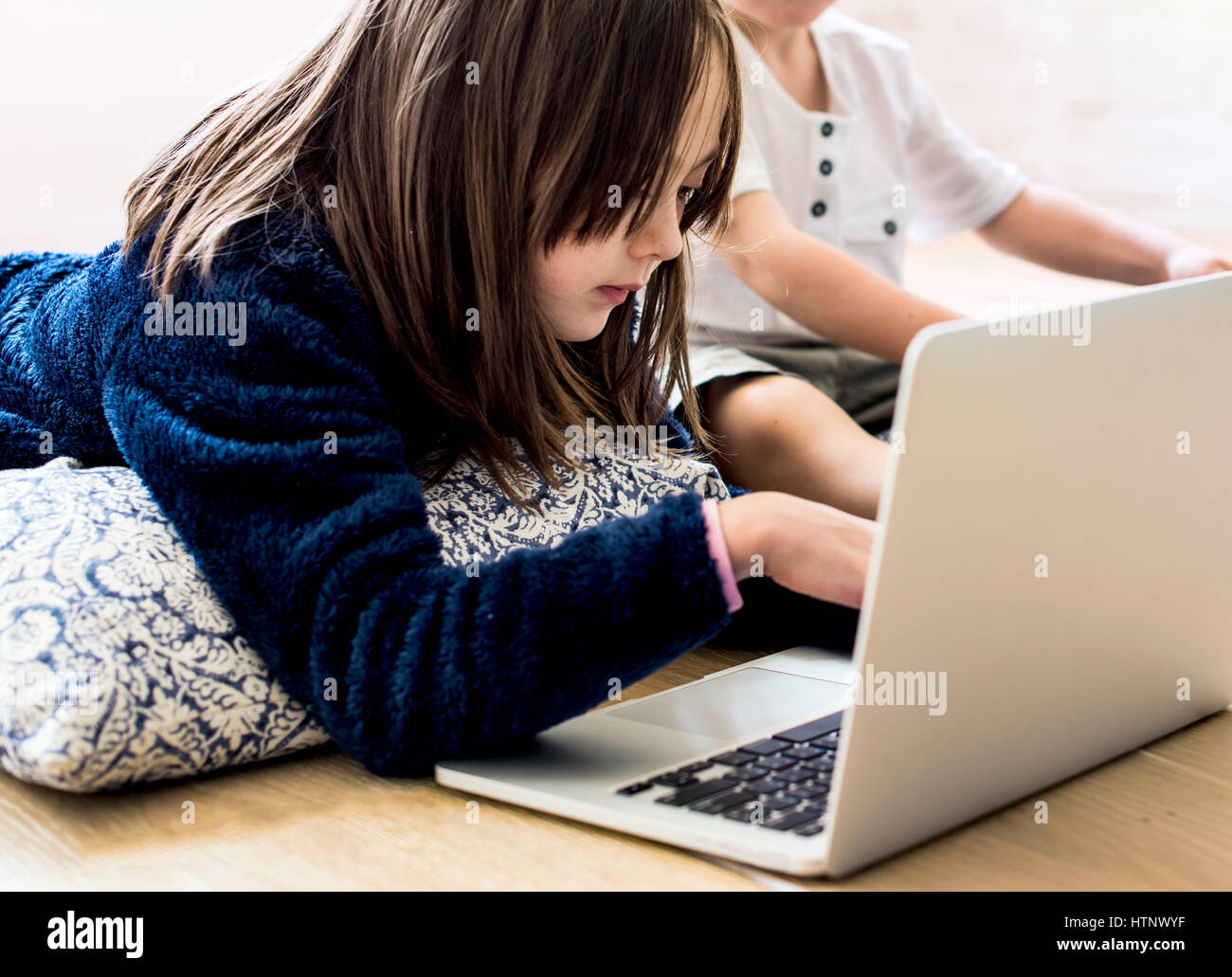 Little Children Experiencing Technology Devices Stock Photo - Alamy