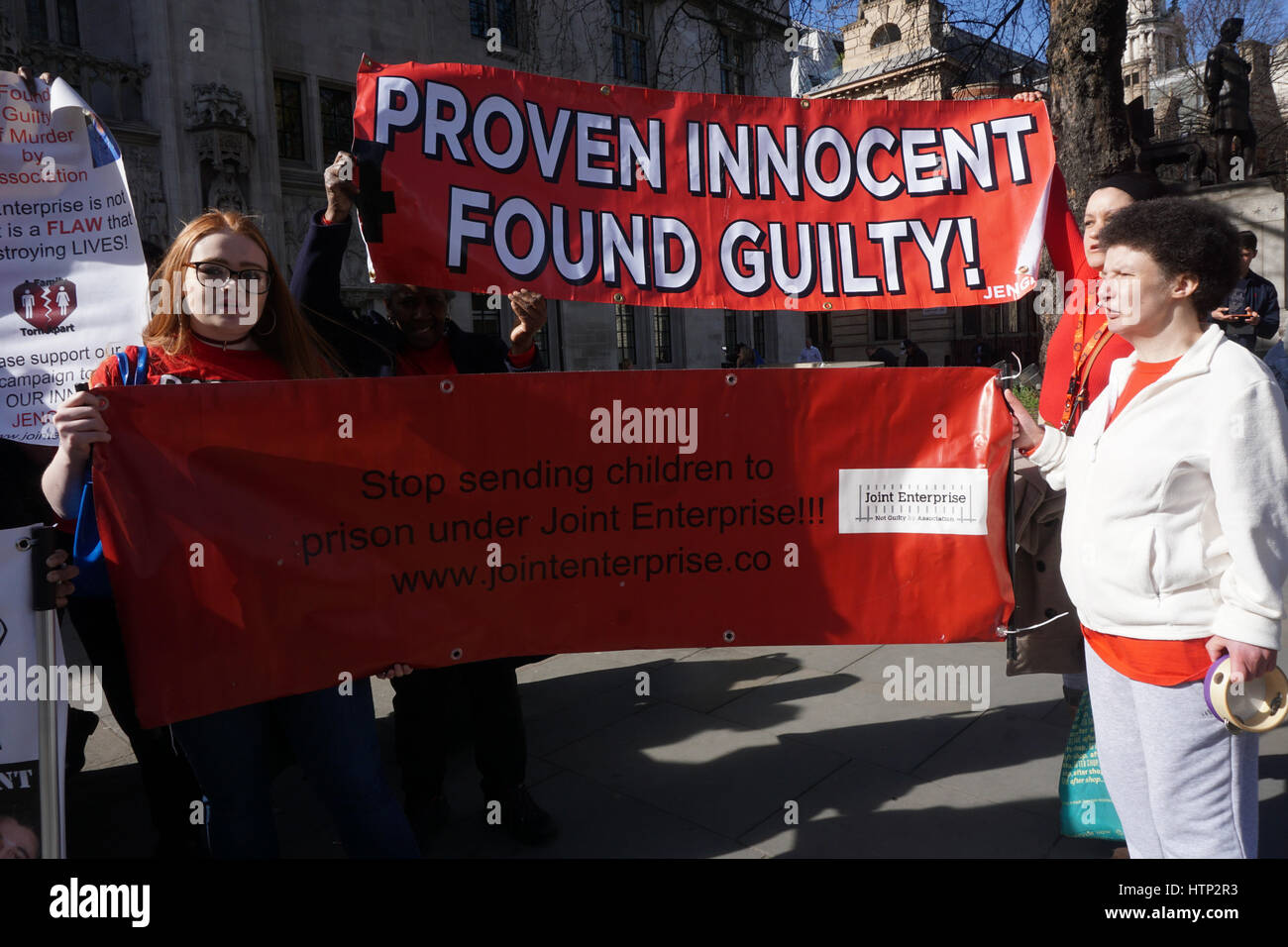London, England, UK. 13th Mar, 2017. Family join together protest ...