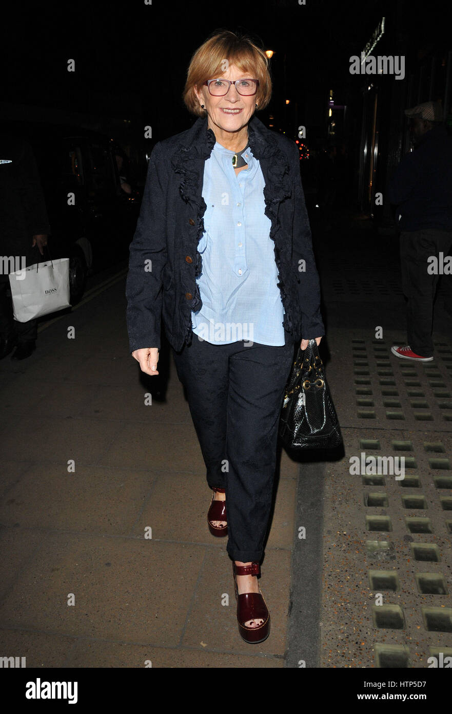 London, UK. Anne Robinson at the CURE3 exhibition private view in aid ...