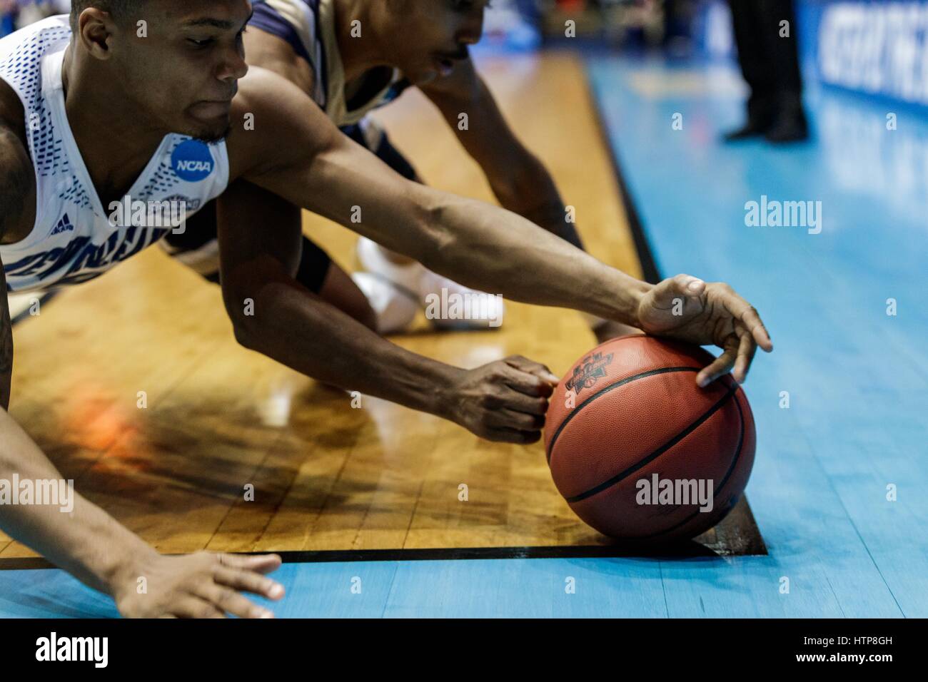 Dayton Arena, Dayton, OH, USA. 14th Mar, 2017. Fighting for the loose ...