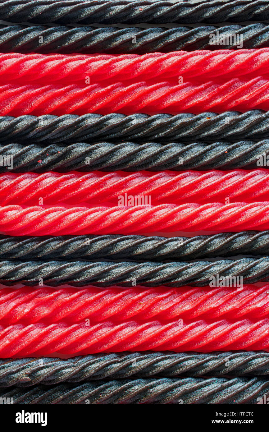 Alternating Red and Black liquorice candy bars - texture or background ...