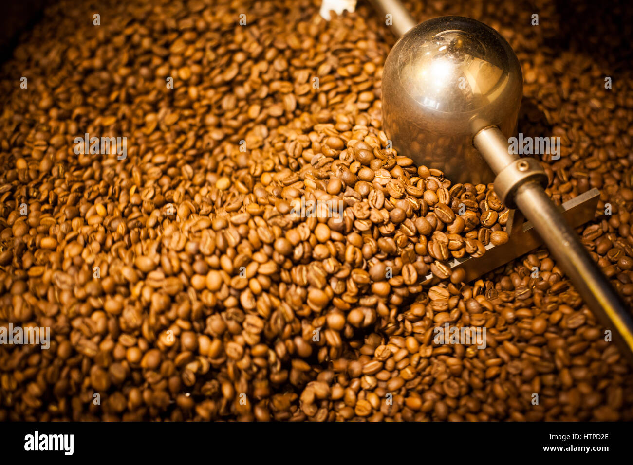 Close up shot of a coffee drying machine Stock Photo - Alamy