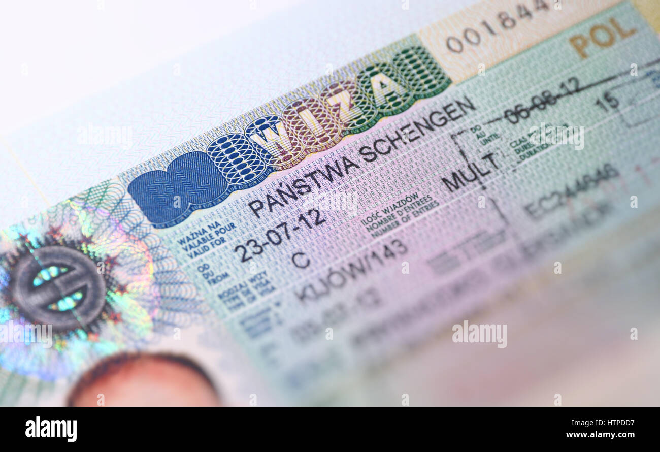 Close-up page of passport with Polish Schengen Visa Stock Photo - Alamy