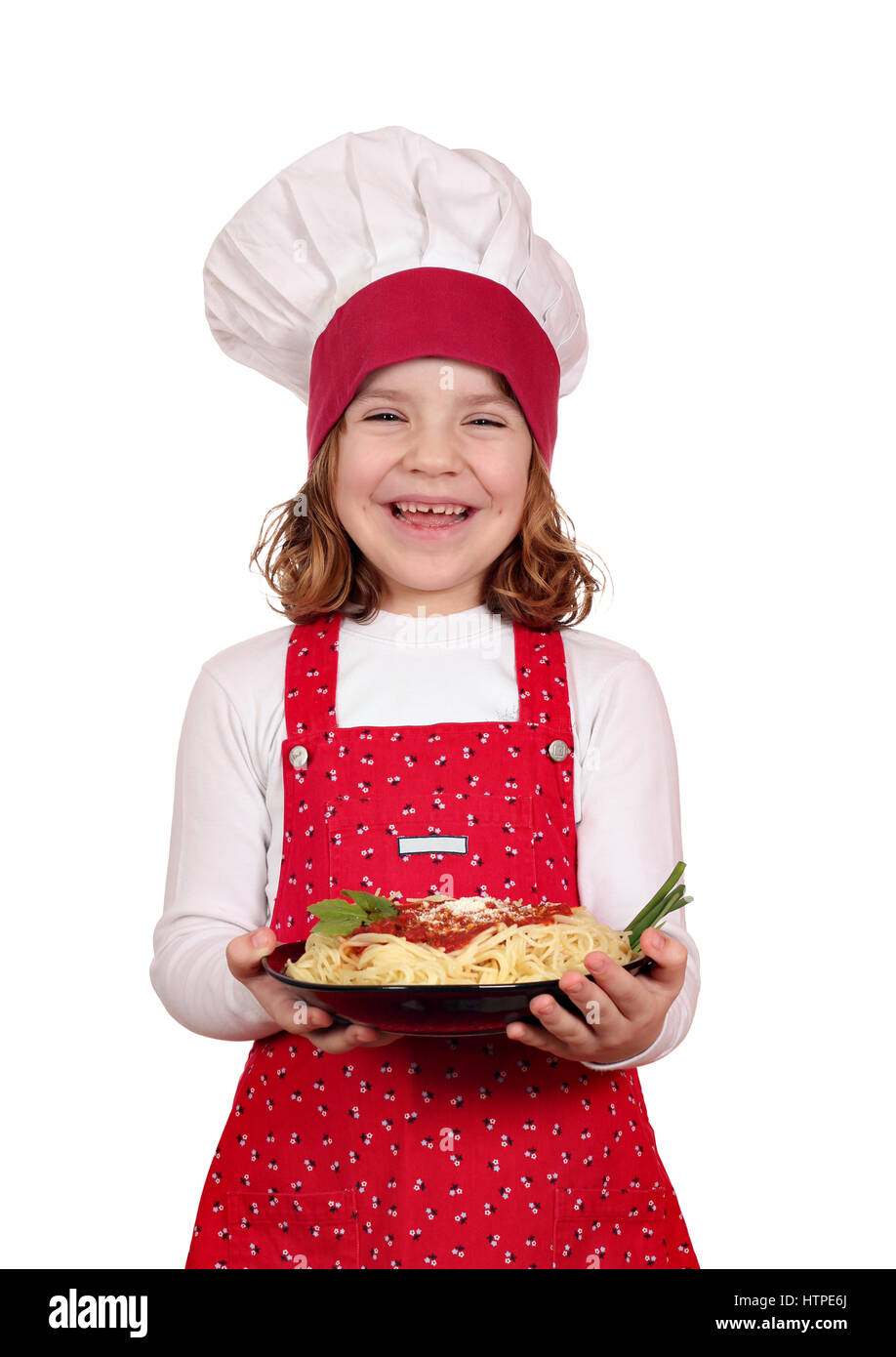 beautiful happy little girl cook with spaghetti Stock Photo - Alamy
