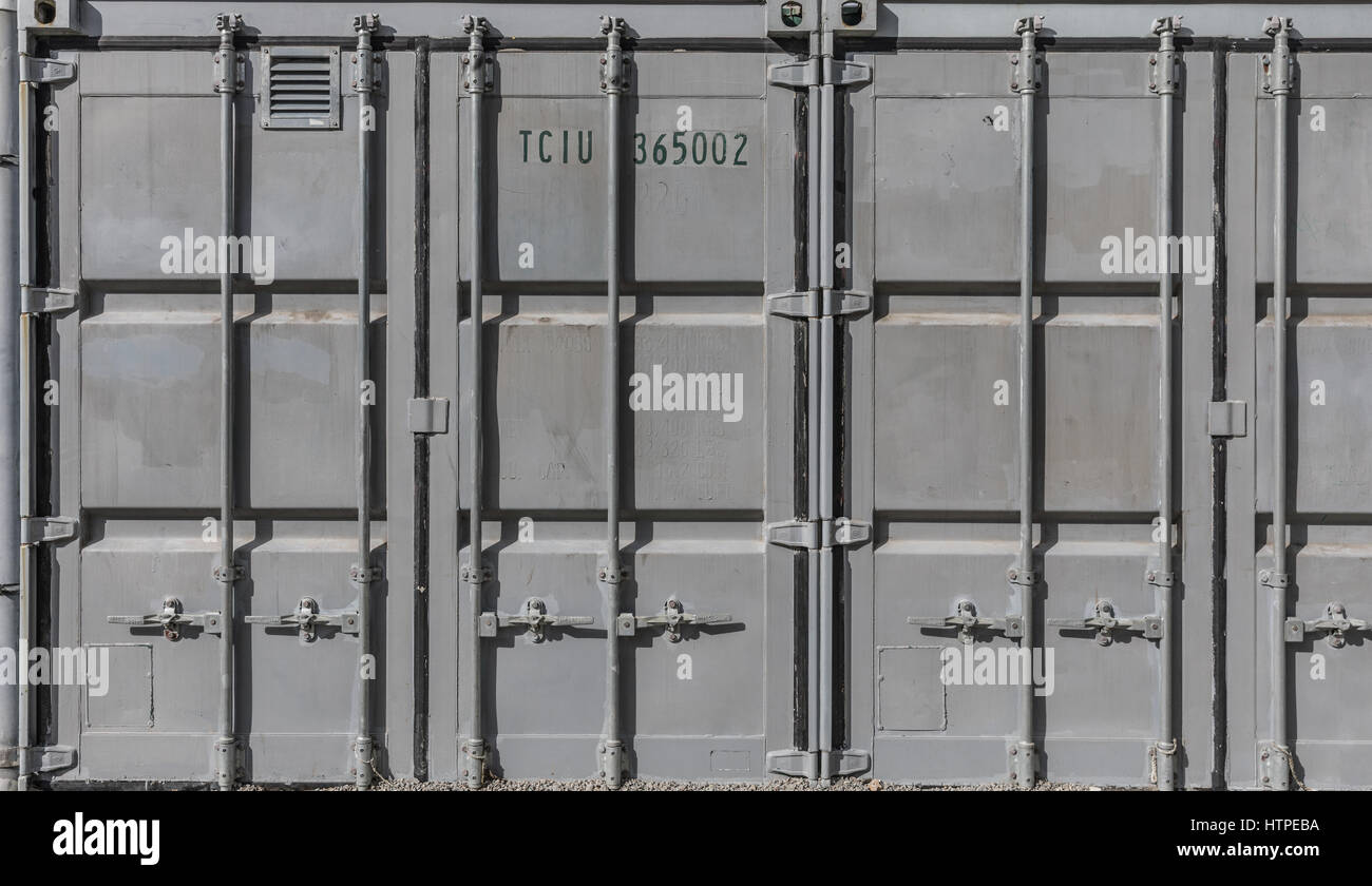Old Container repainted in gray over the specifications Stock Photo - Alamy