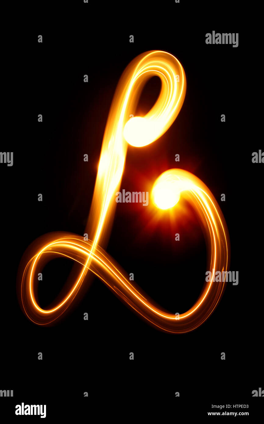 L - Created by light alphabet over black background Stock Photo - Alamy