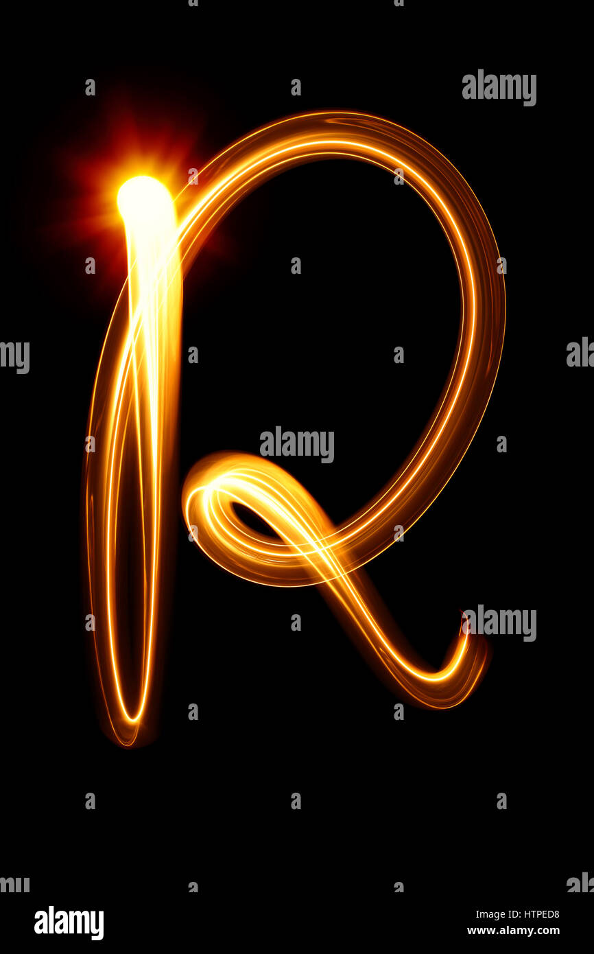 R - Created by light alphabet over black background Stock Photo - Alamy