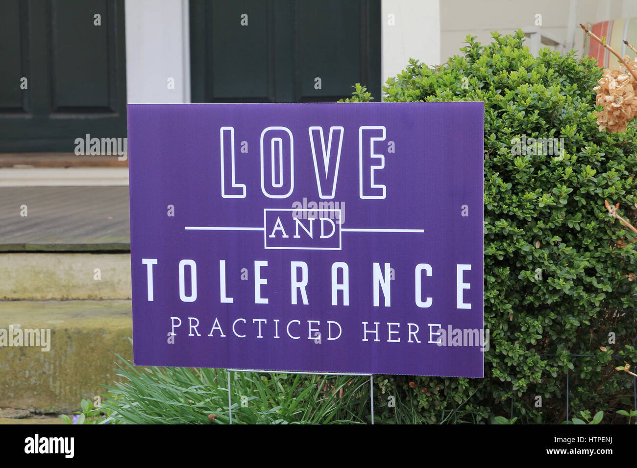 Yard Sign Love and Tolerance Practiced Here Stock Photo - Alamy