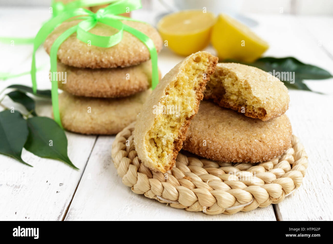 Shortbread lemon flavored cookies: a broken and connected green ribbon ...