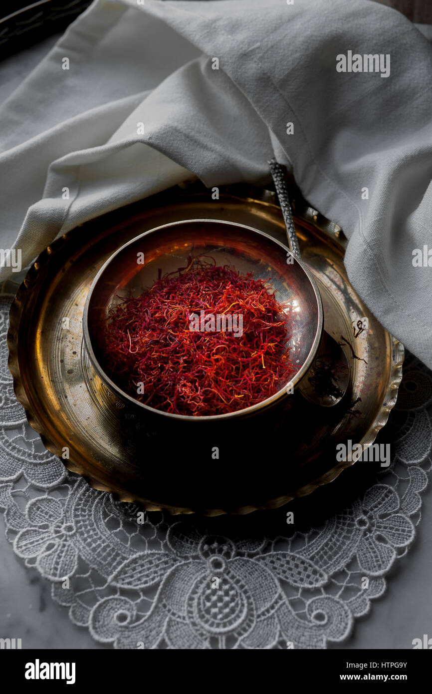 Spanish Saffron in a metal bowl Stock Photo - Alamy