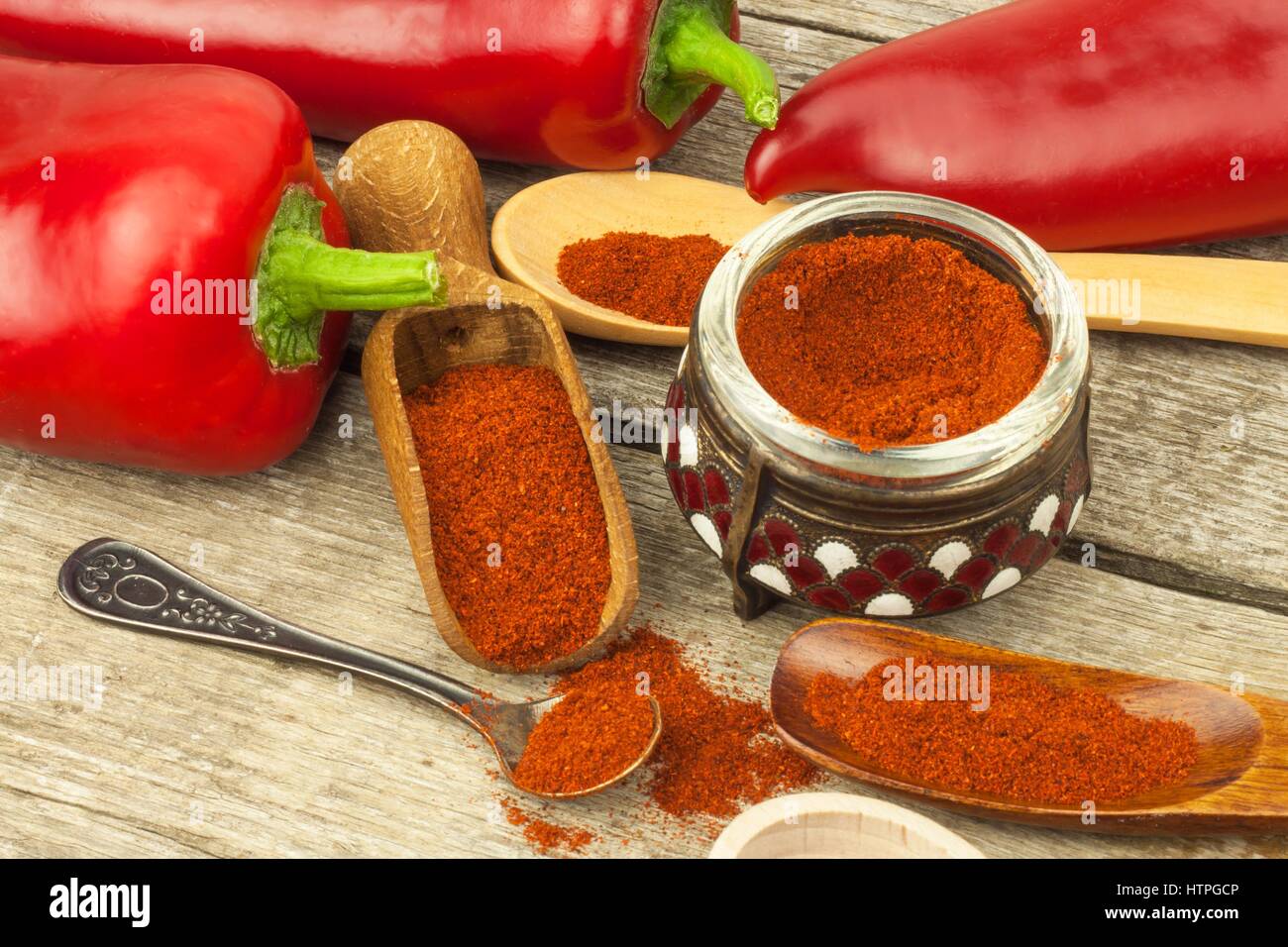 Dried red pepper. Traditional spices. Kitchen table with dried and ...