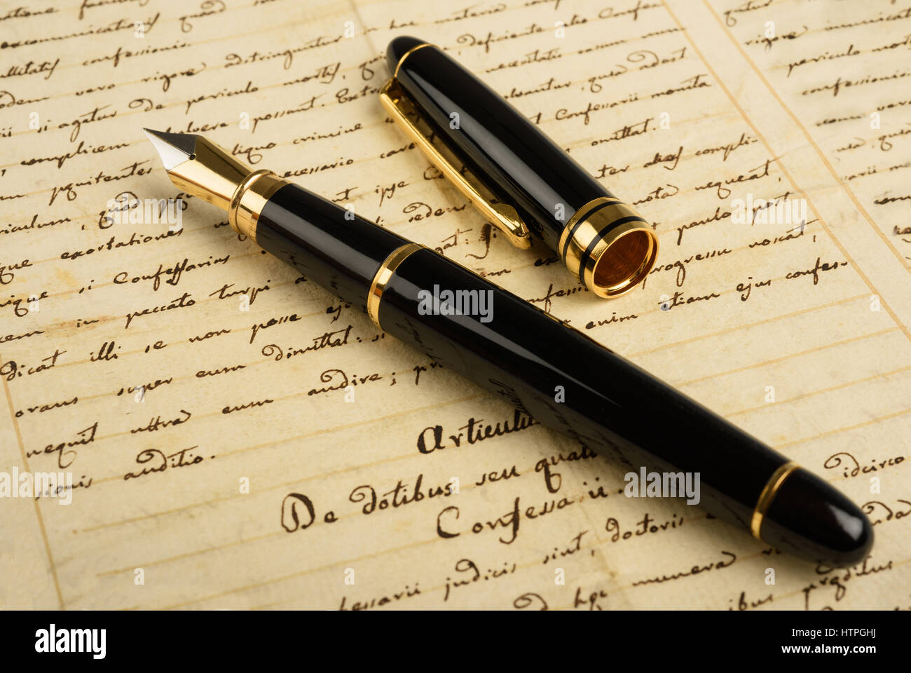 Fountain pen on letter background Stock Photo - Alamy