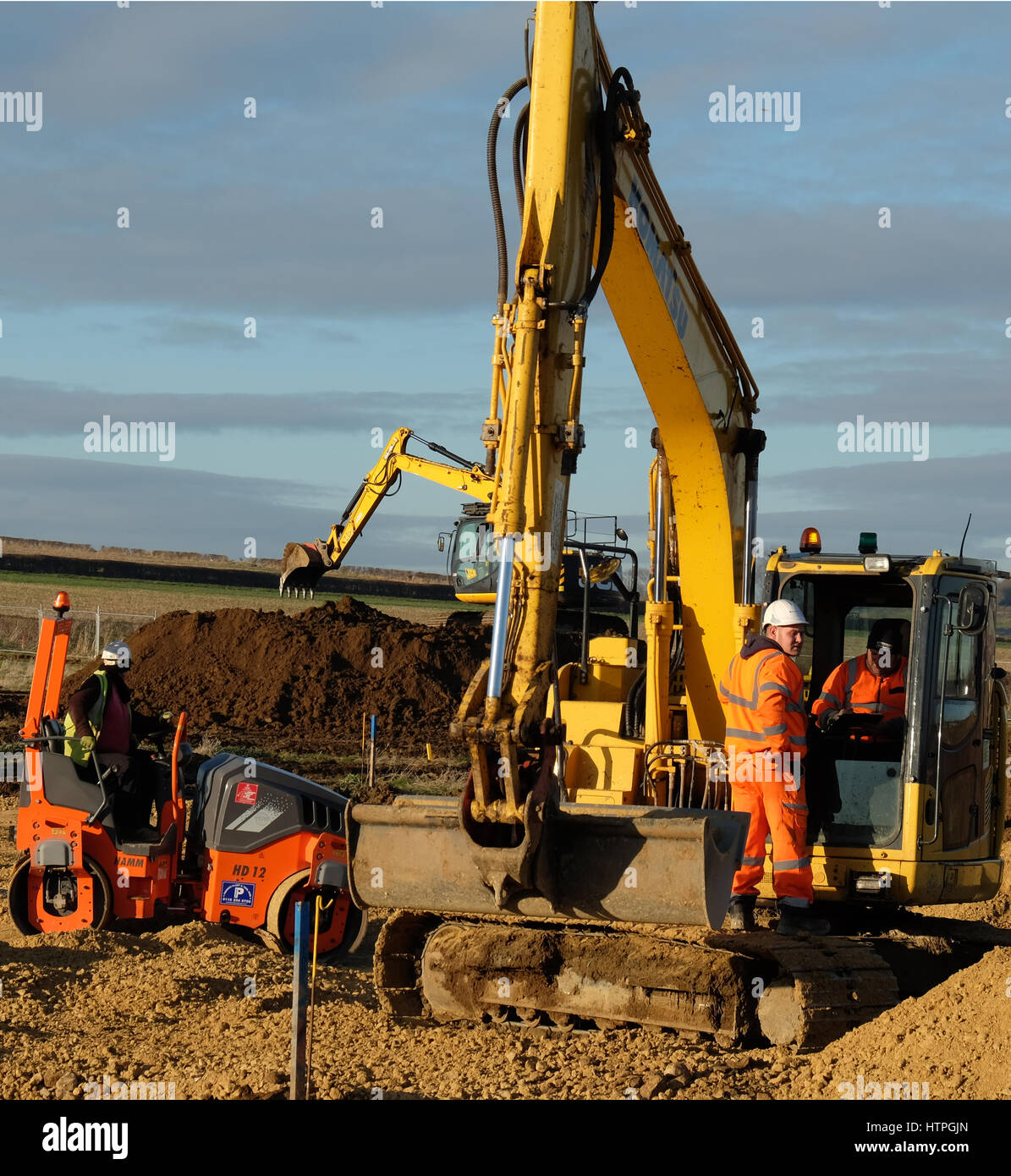 Heavy machinery used in the preparation of land for house building ...