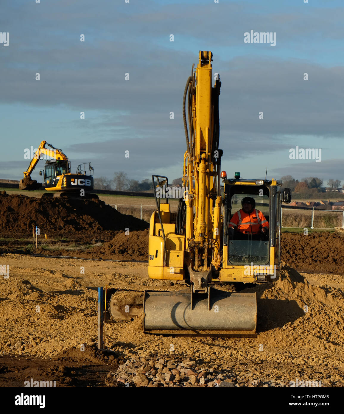 Heavy machinery used in the preparation of land for house building ...