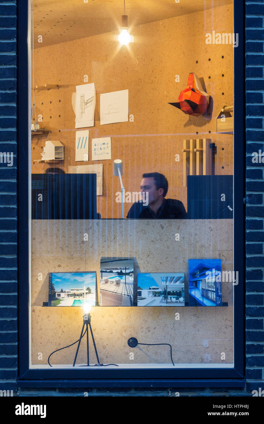 Exterior view through office window at dusk. Selenky Parson Office ...