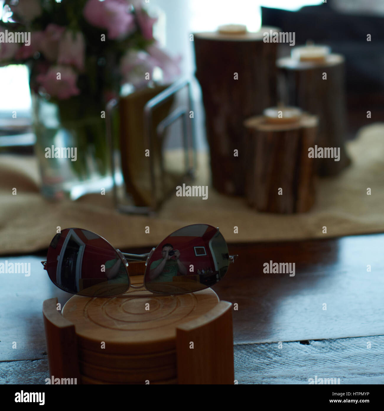 Sunglasses on a Table Stock Photo - Alamy