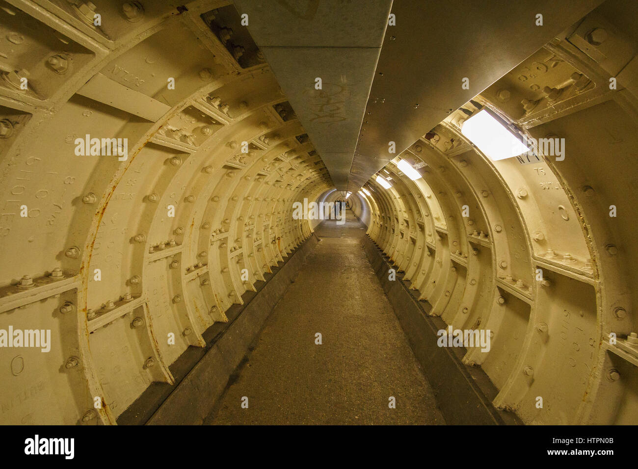 Long vintage tunnel under the river Thames in Greenwich, London ...