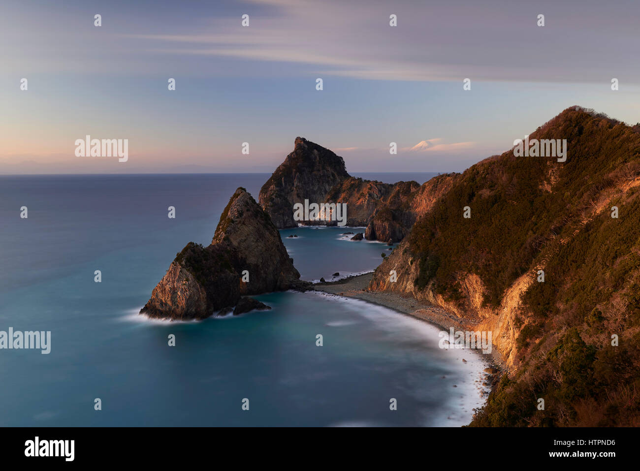 View of Mount Fuji and sea cost at sunset from Senganmon cliff ...