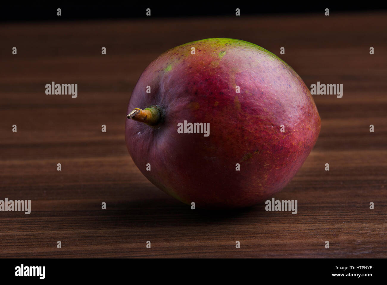 Mango apple on table hi-res stock photography and images - Alamy