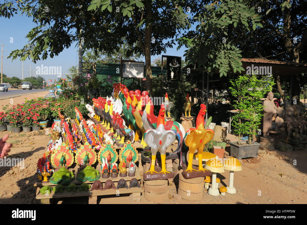 Lots of statues at roadside shop Stock Photo - Alamy