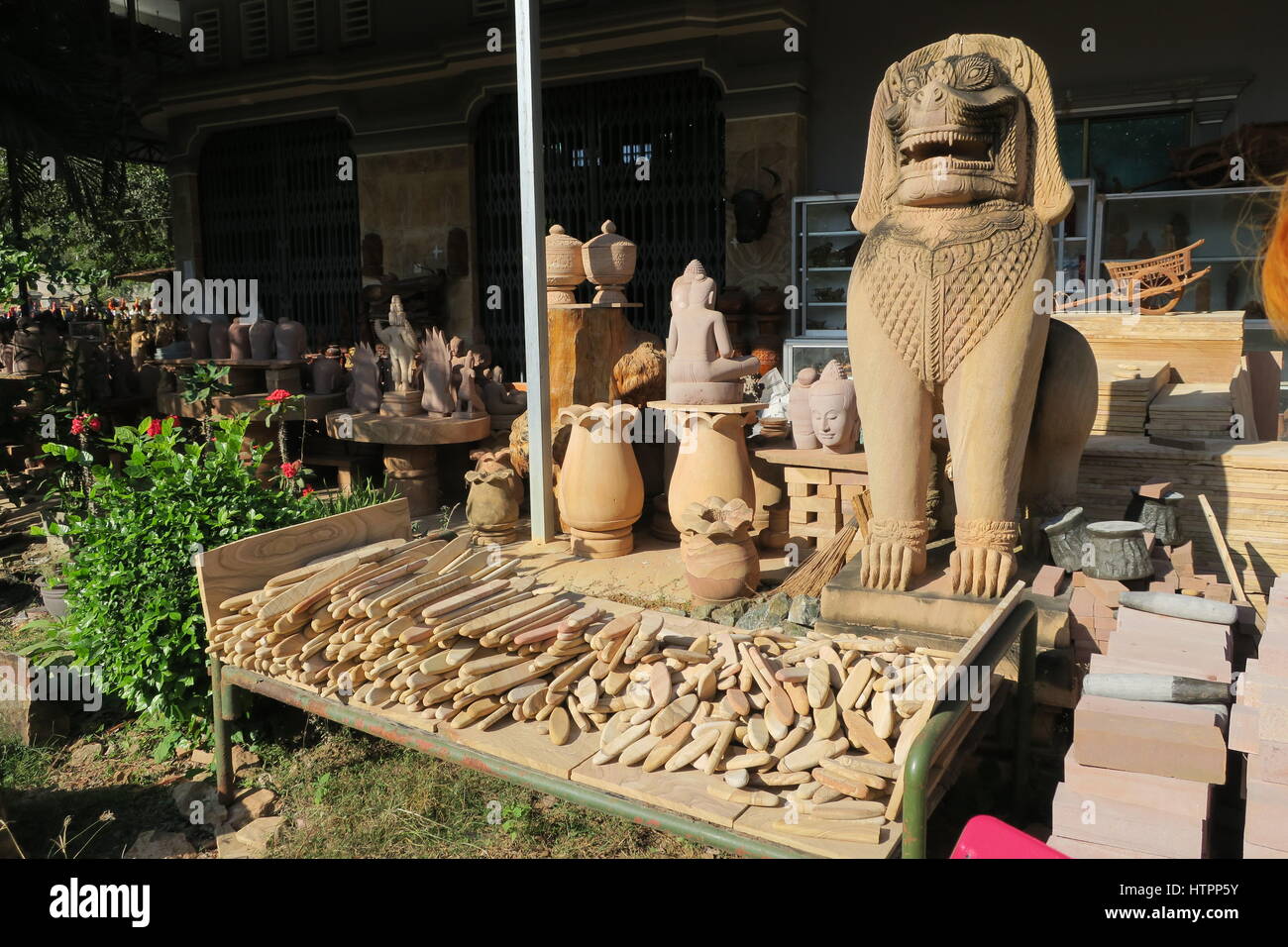 Lots of statues at roadside shop Stock Photo - Alamy