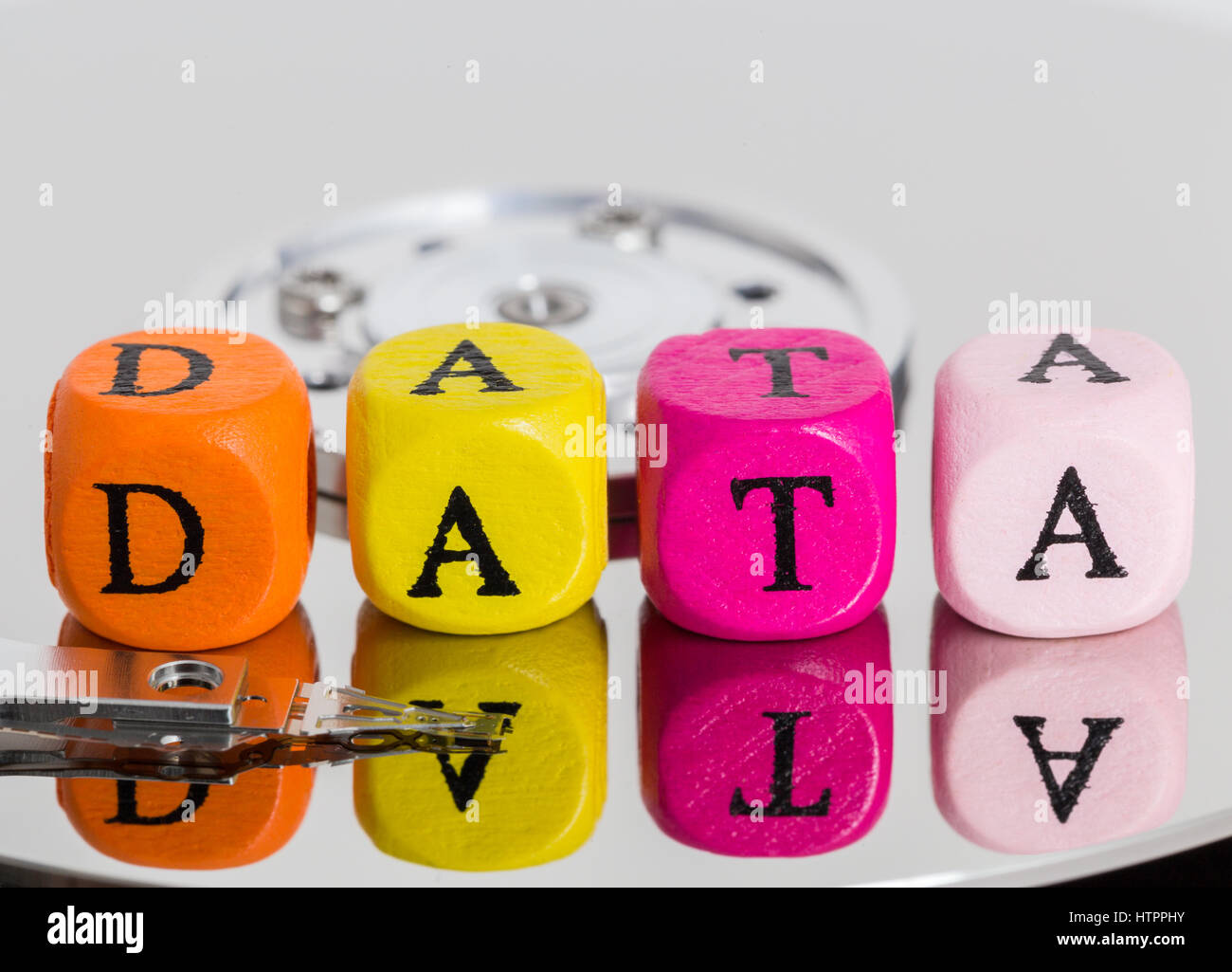 Data letter cube on hard disk concept Stock Photo - Alamy Data letter cube on hard disk concept Stock Photo - Alamy