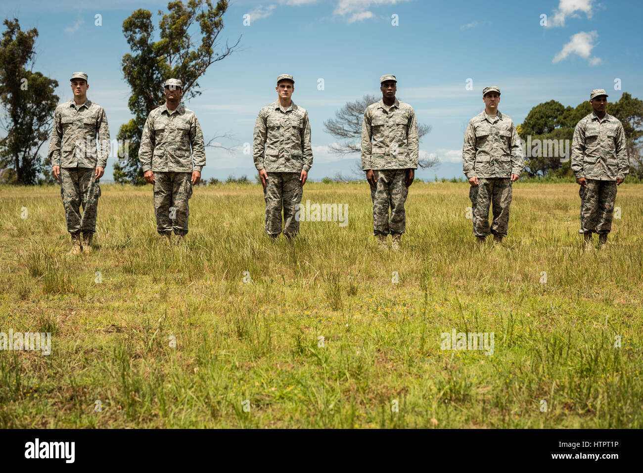 Group of military soldiers standing in line at boot camp Stock Photo ...
