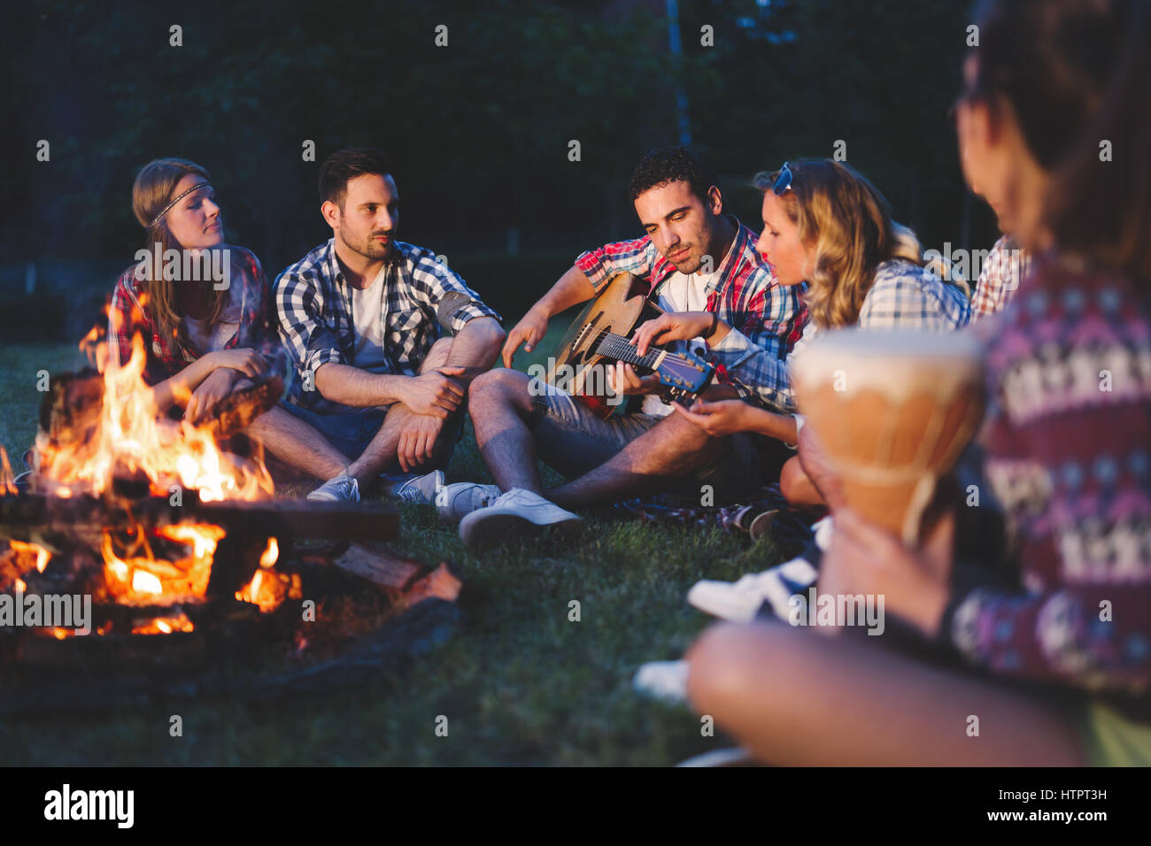 Woman picnic bonfire in hi-res stock photography and images - Alamy