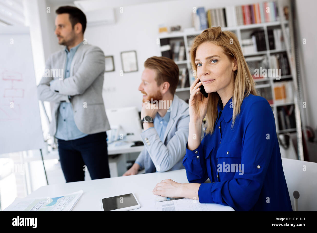 Busy business people working in office Stock Photo - Alamy