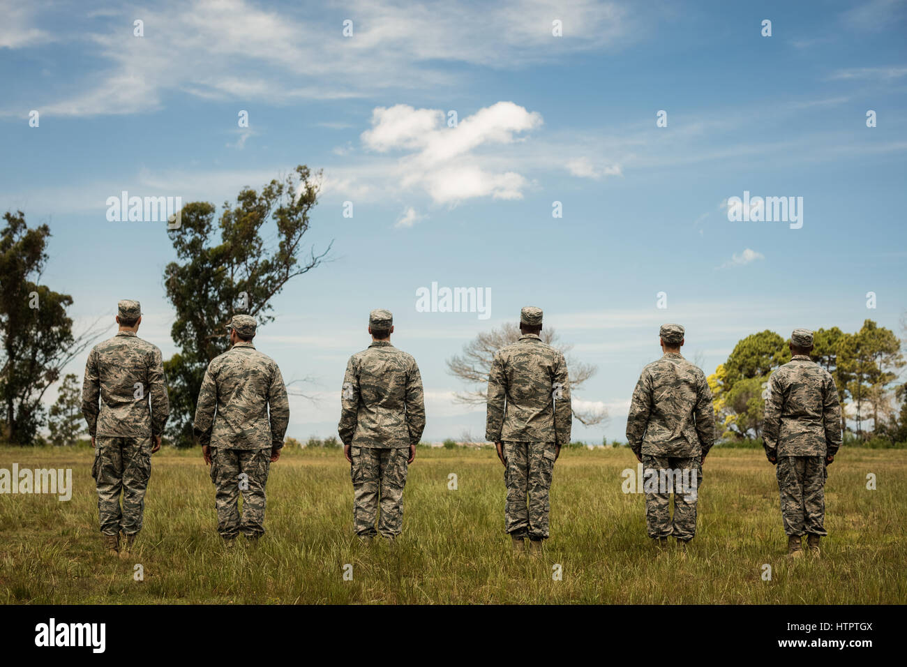 Group of military soldiers standing in line at boot camp Stock Photo ...