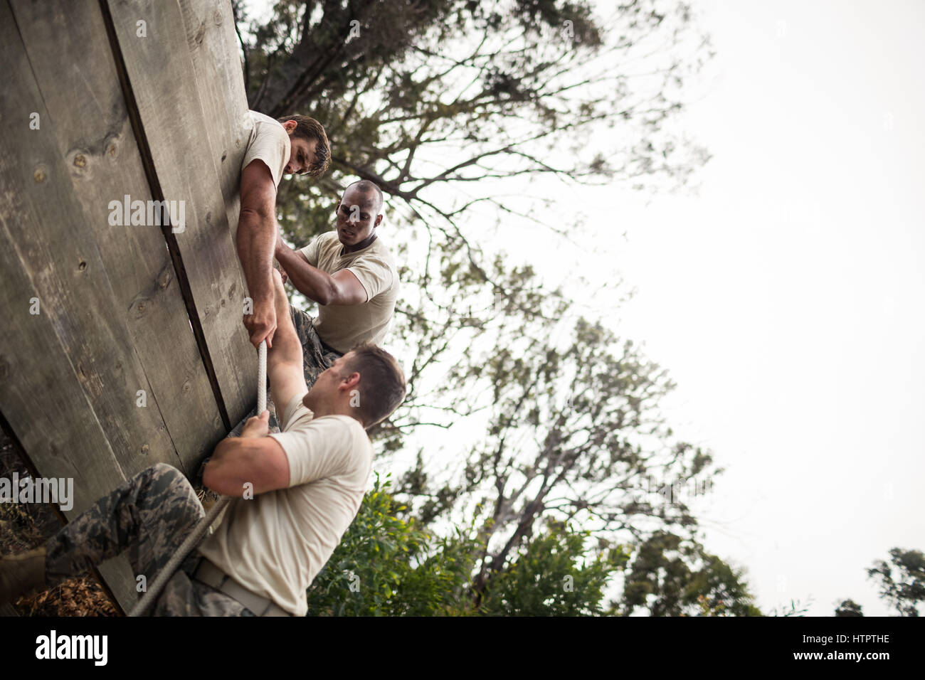 Soldiers climbing wooden wall in hi-res stock photography and images ...