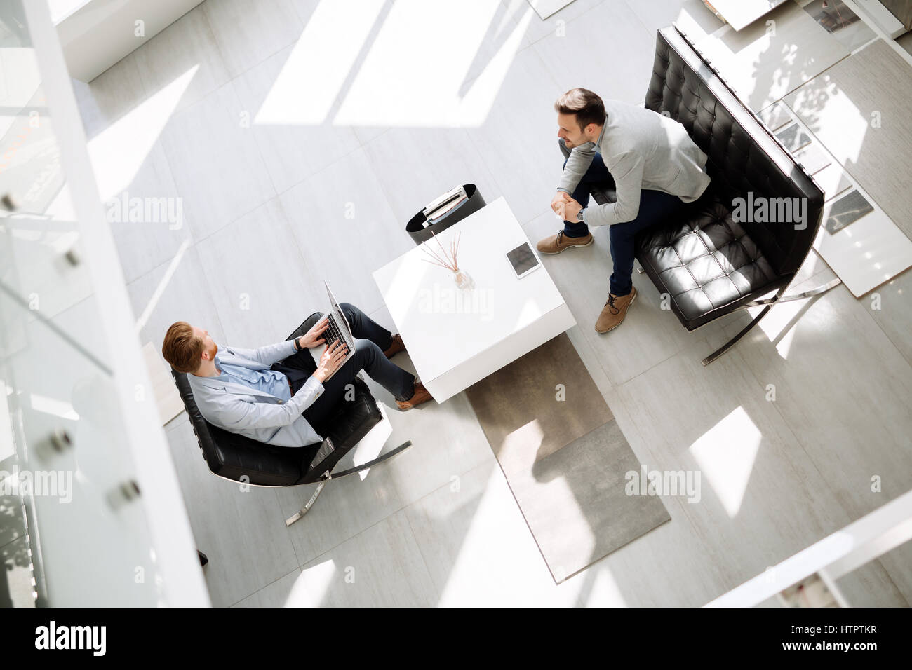 Two businessmen at work people hi-res stock photography and images - Alamy