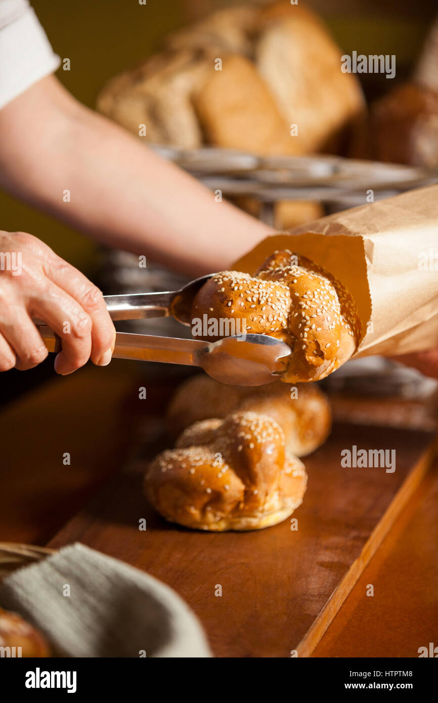Hand in sweet bag hi-res stock photography and images - Alamy