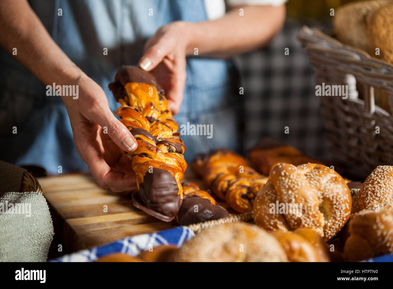 Smiling bakery staff arranging hi-res stock photography and images - Alamy