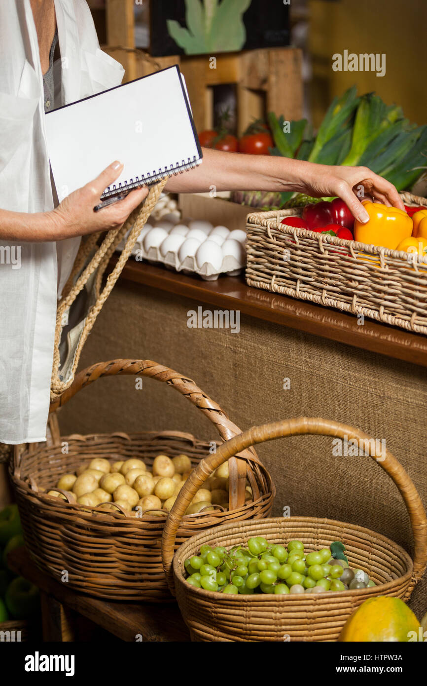 Staff checking red bell hi-res stock photography and images - Alamy