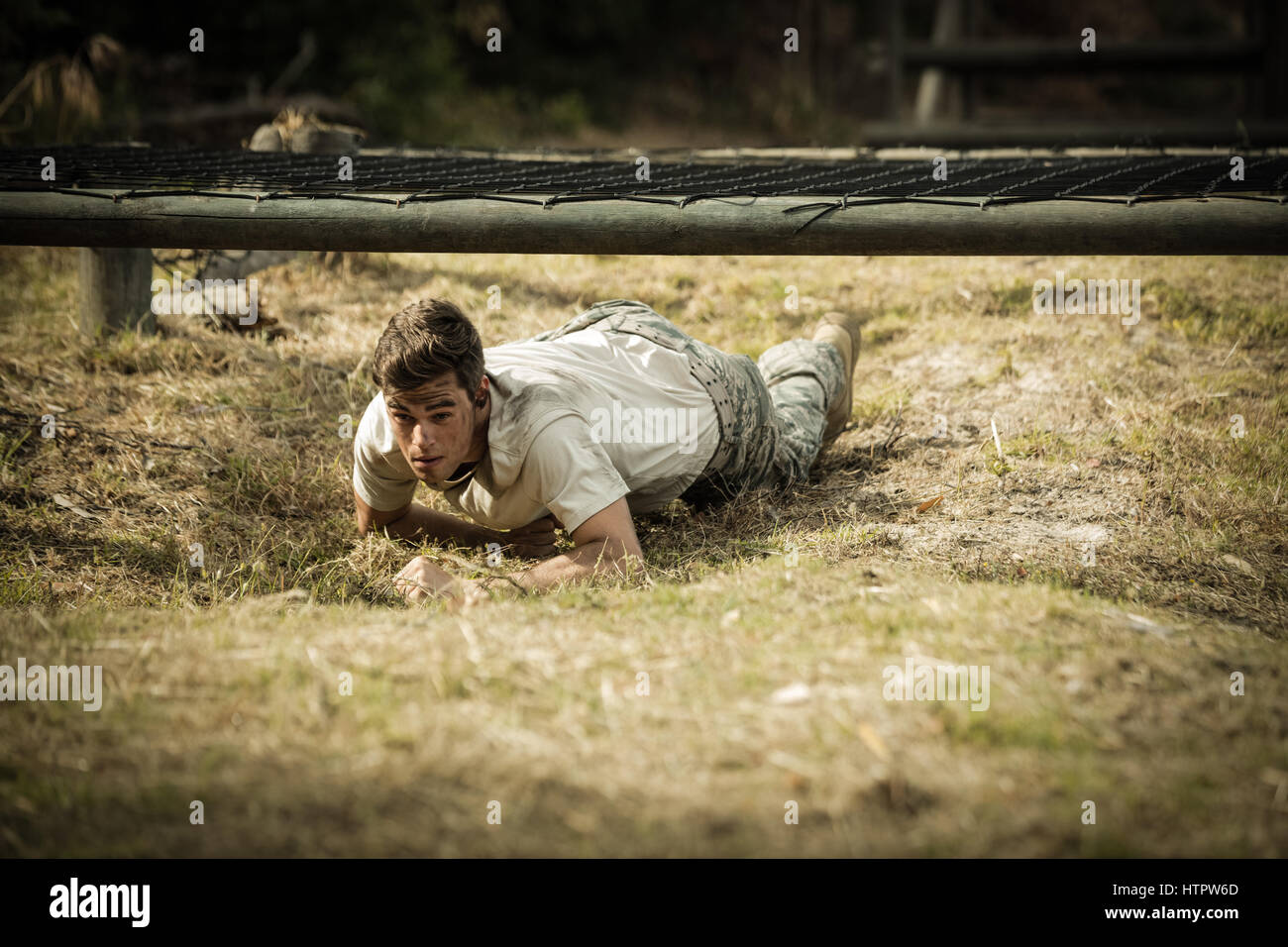 Crawling under net hi-res stock photography and images - Alamy
