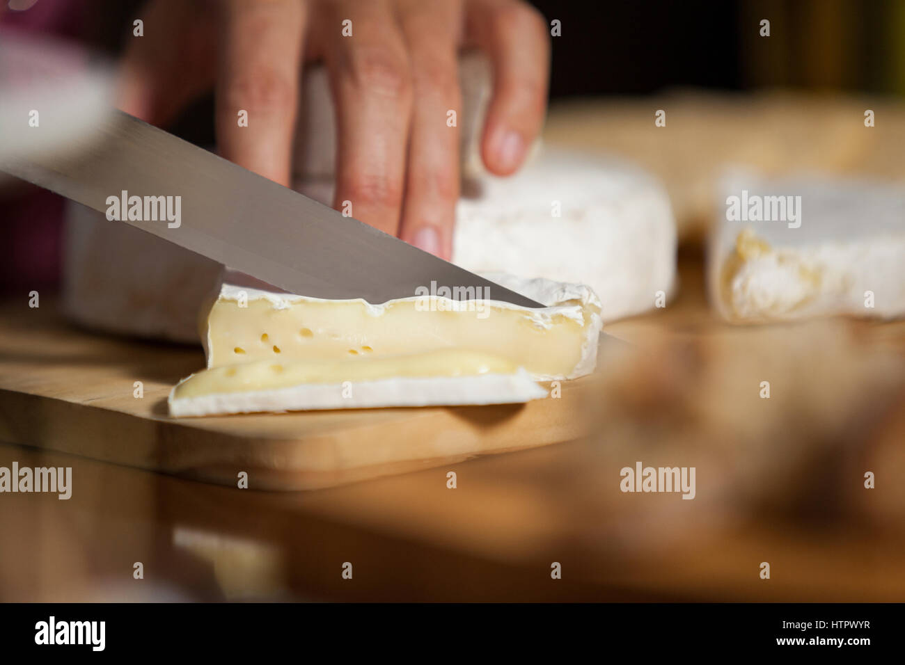 Cheese cutting expertise hi-res stock photography and images - Alamy
