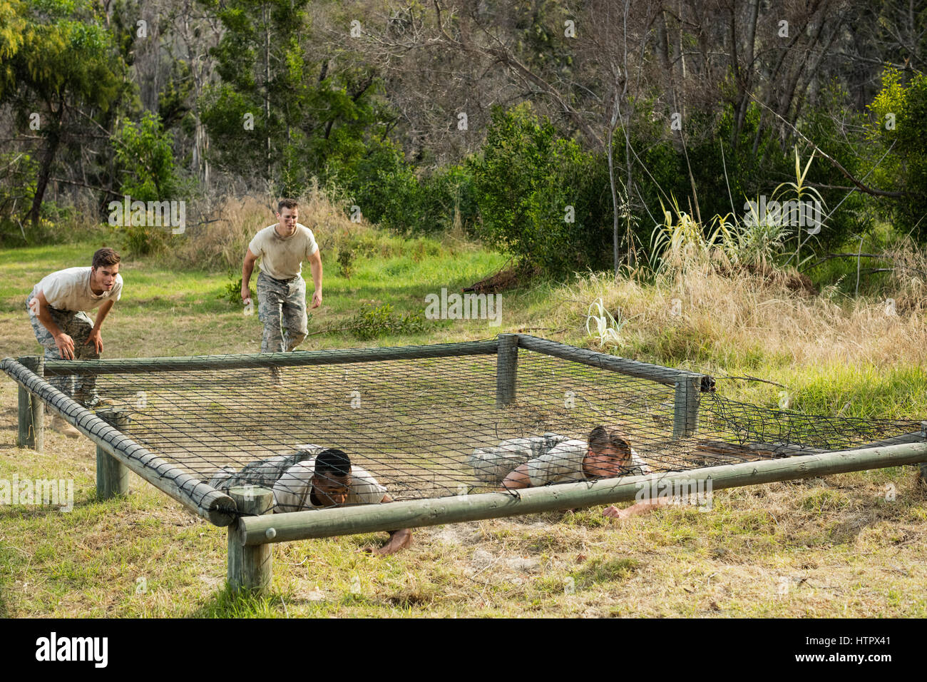 Crawling under net hi-res stock photography and images - Alamy
