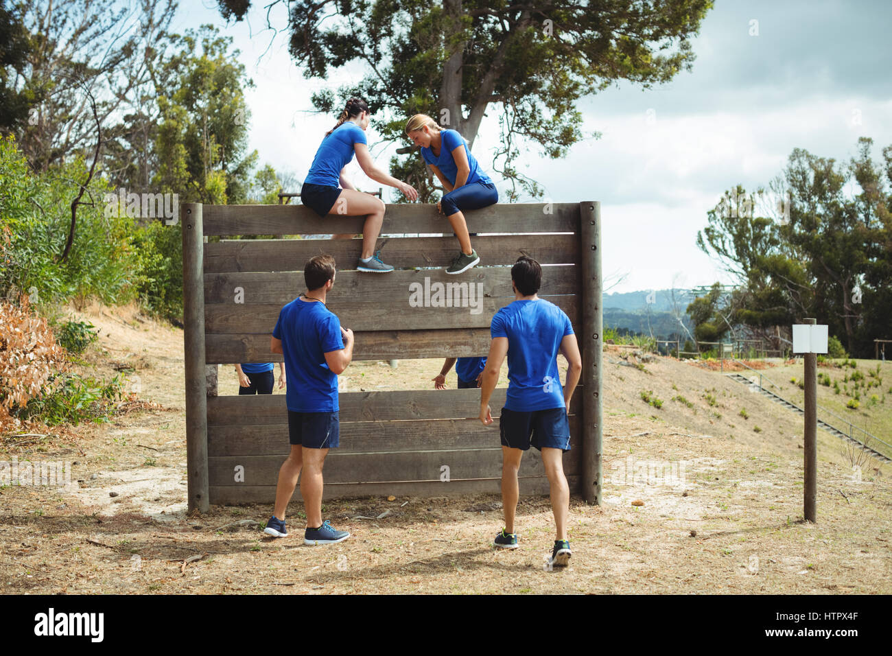 Climb over wall hi-res stock photography and images - Alamy