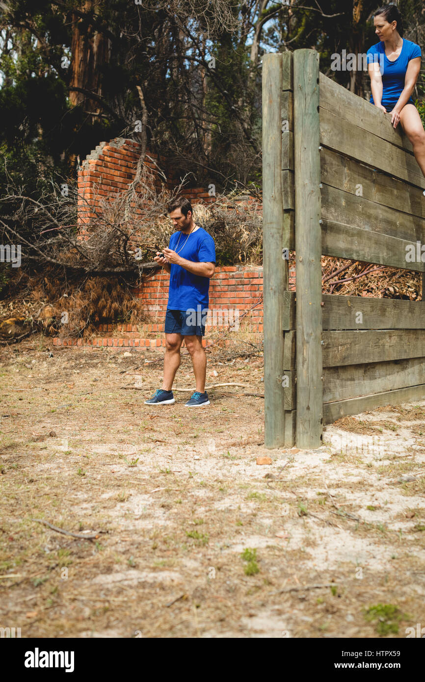 Woman standing over man hi-res stock photography and images - Alamy