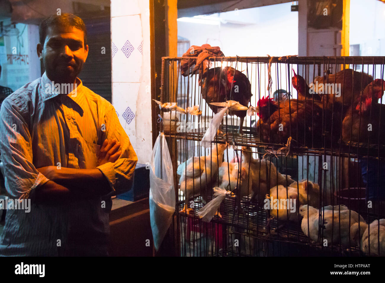 SRIMANGAL, BANGLADESH - FEBRUARY 2017: Man with a small shop selling ...