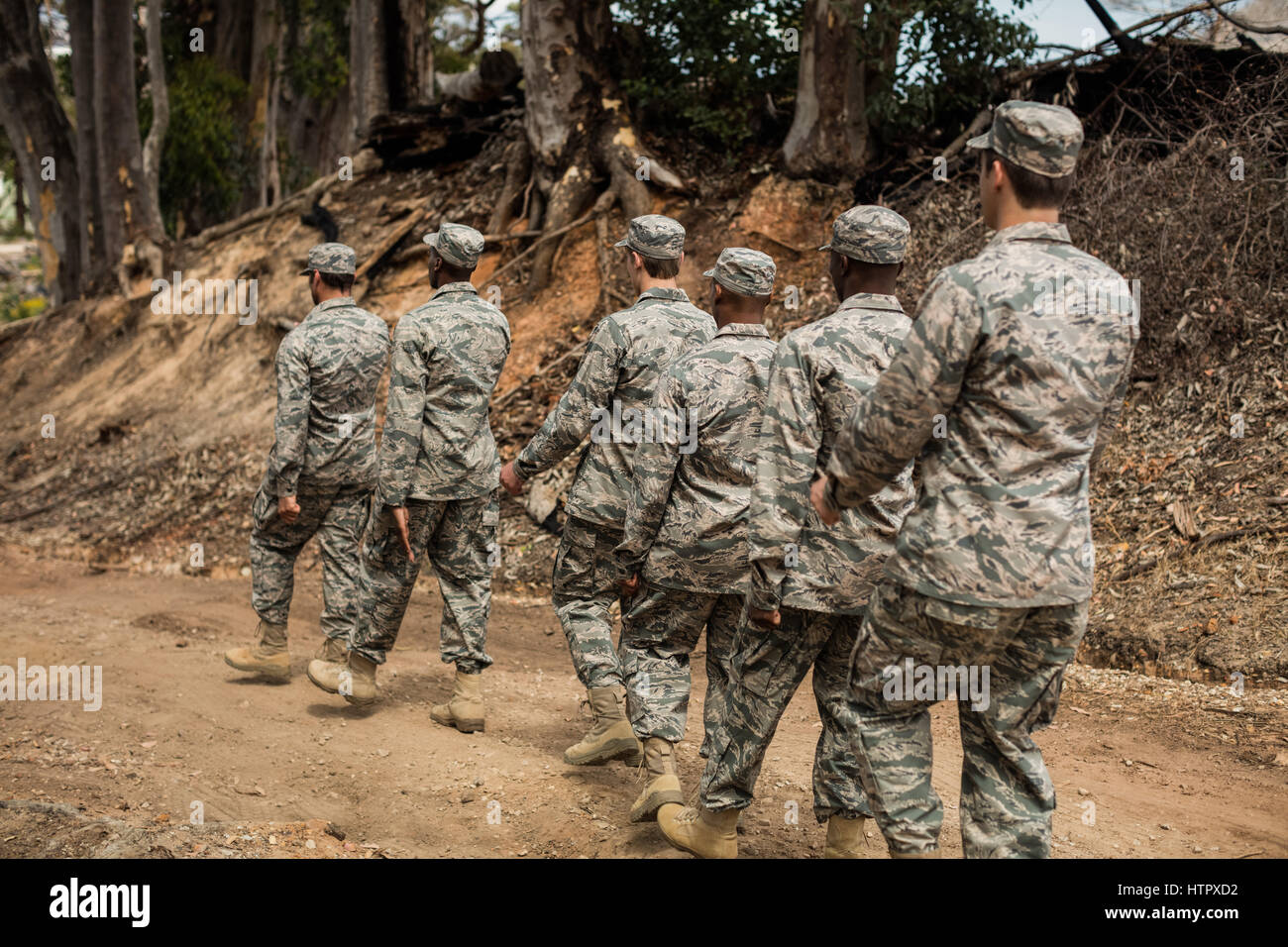 Army soldier walking in a row uniform hi-res stock photography and ...