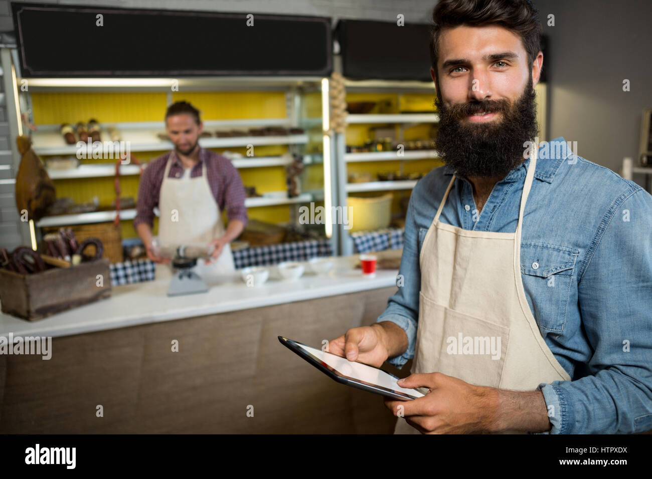 Supermarket meat counter service staff hi-res stock photography and ...