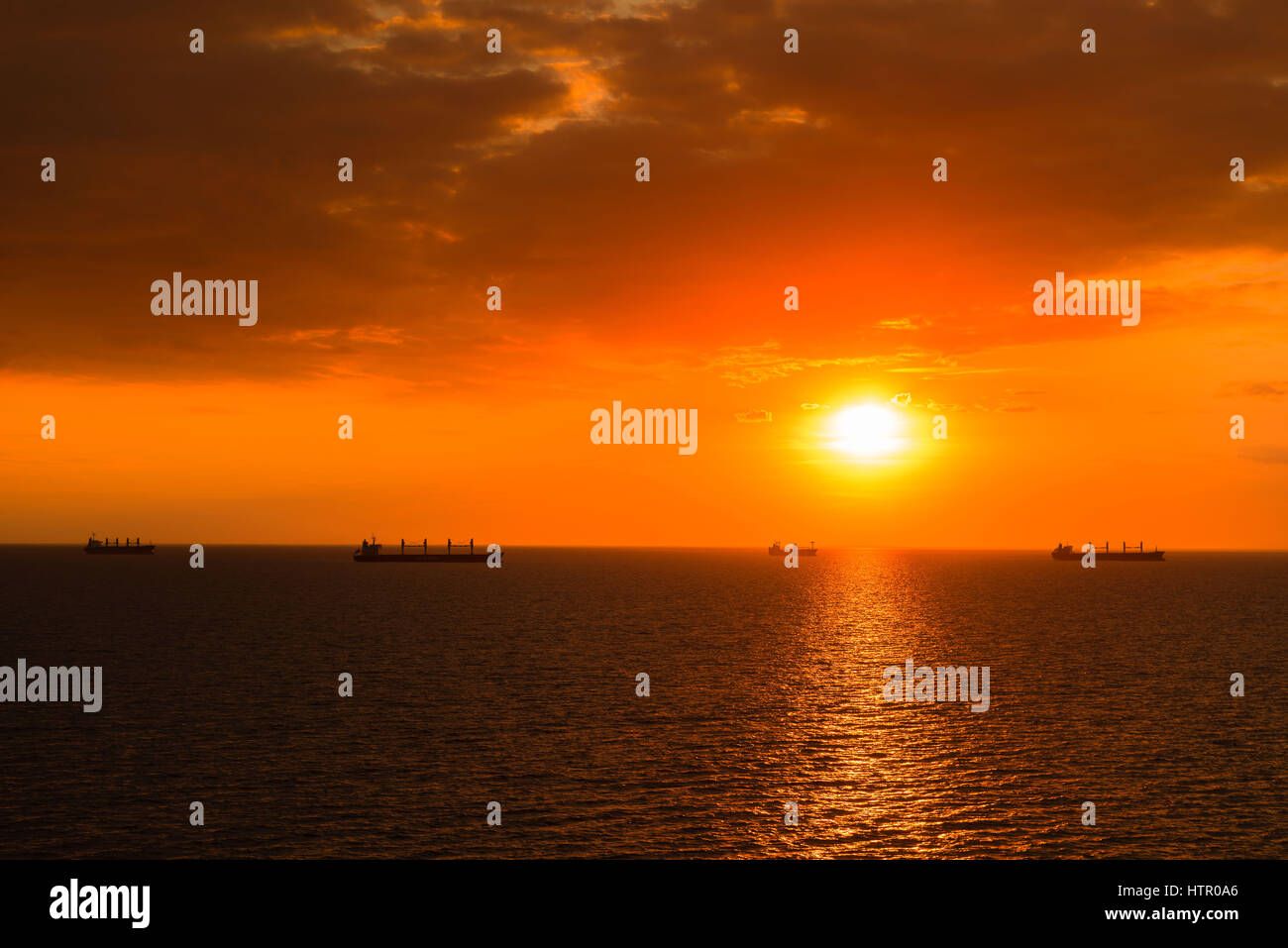 Ocean lane, colorful sunset and impressive evening clouds, Baltic Sea ...