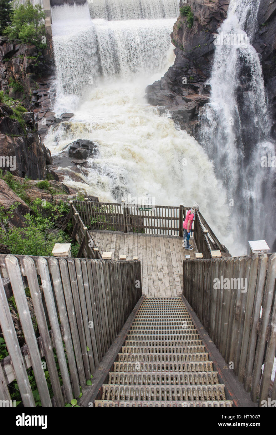 pretty girl watching waterfalls Stock Photo - Alamy